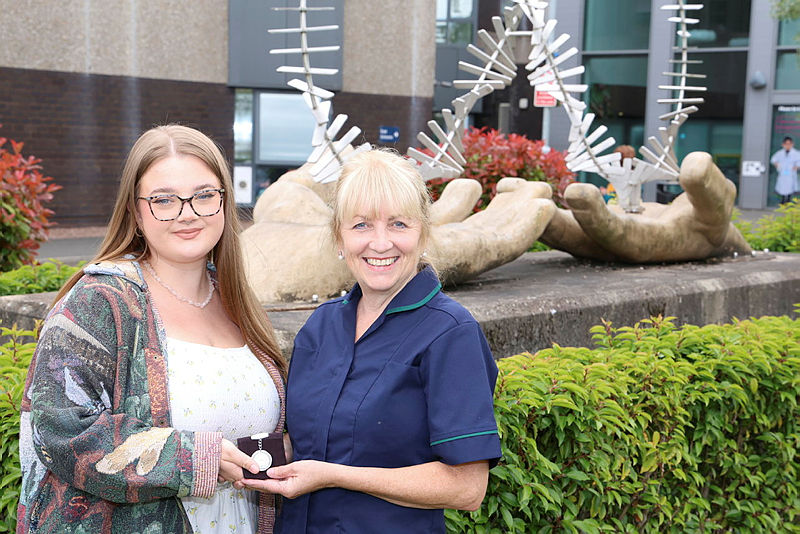 Aunt passes fob watch to student nurse niece after stellar career ...
